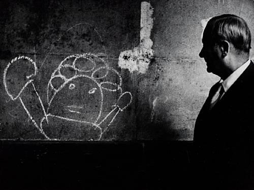 Brassaï | Miro looking at a graffiti (1955) | MutualArt