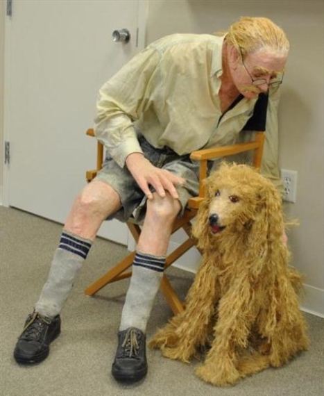 Unknown | Life-size decrepit old man sculpture with dog | MutualArt
