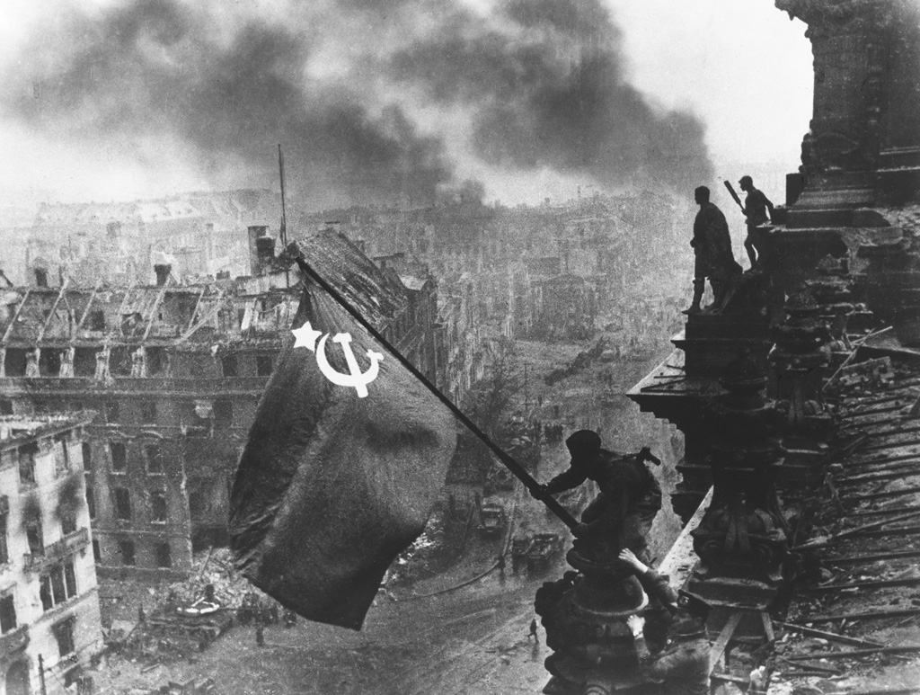 Yevgeny Khaldei | Raising a flag over the Reichstag, Berlin | MutualArt