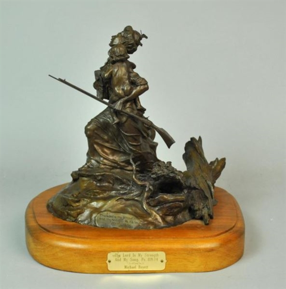 Michael Boyett | Sculpture of a pioneer woman with child, holding a ...