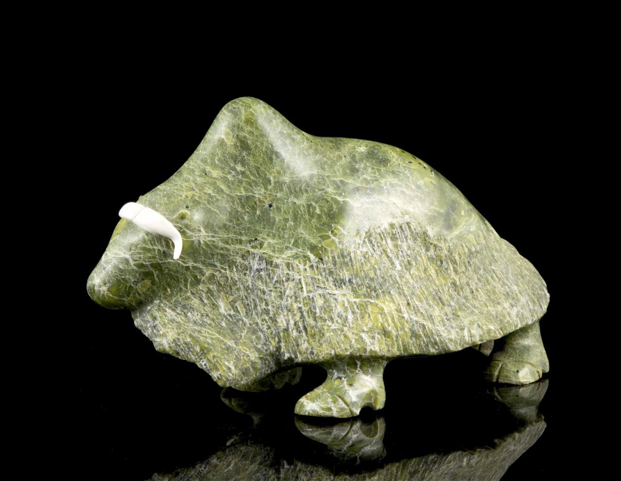 Enook Manomie | A green stone carving of a muskox | MutualArt