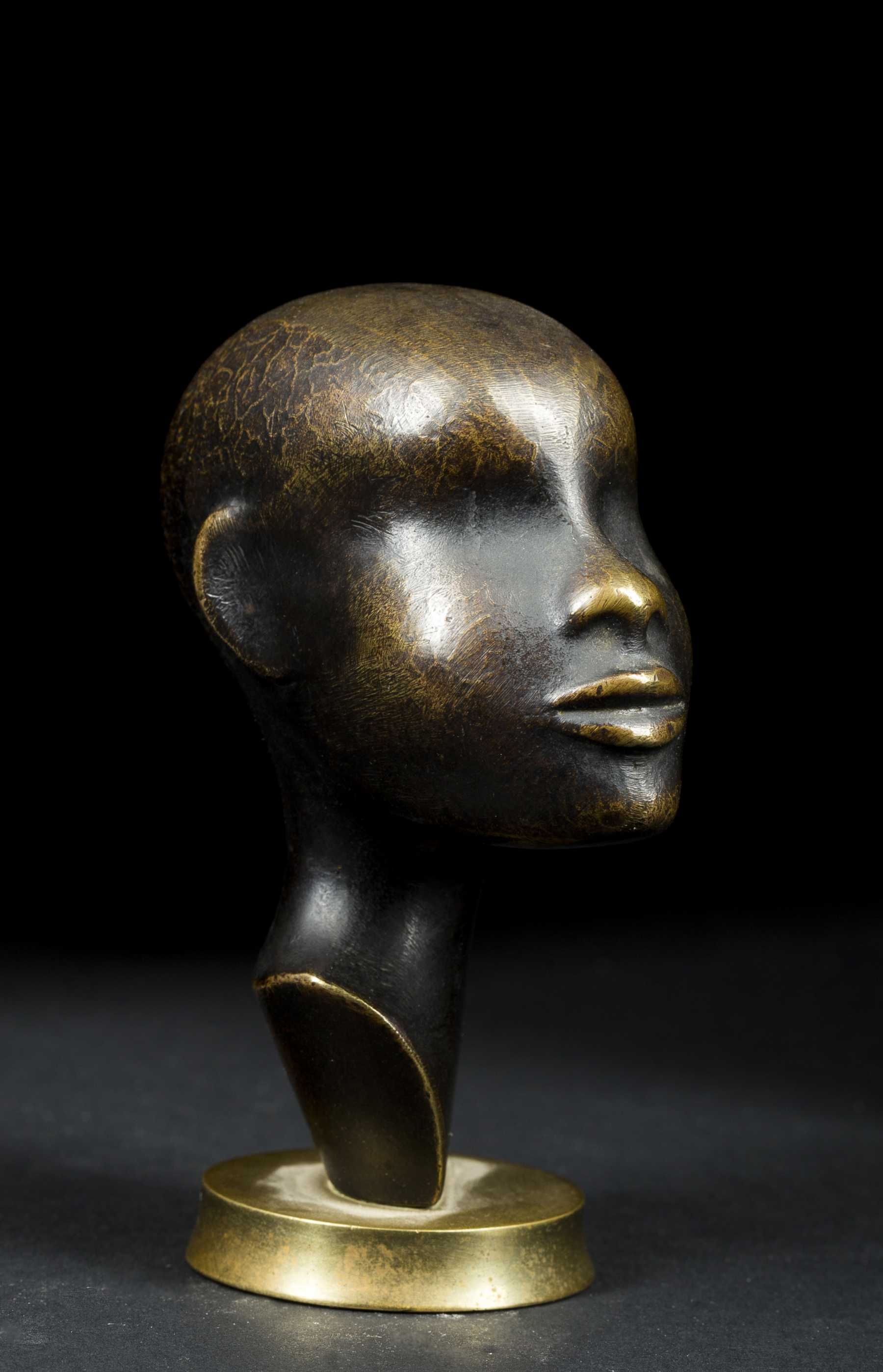 Franz Hagenauer | Head set on a round brass base | MutualArt