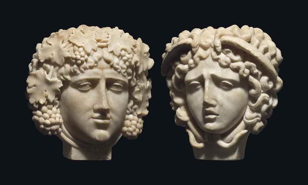 Italian School, 19th Century | A PAIR OF ALABASTER MASKS OF BACCHUS AND ...