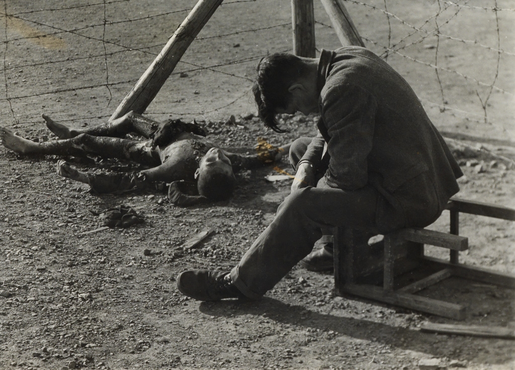 Margaret Bourke-White | Erla Work Camp: A Pole sits bowed with grief ...
