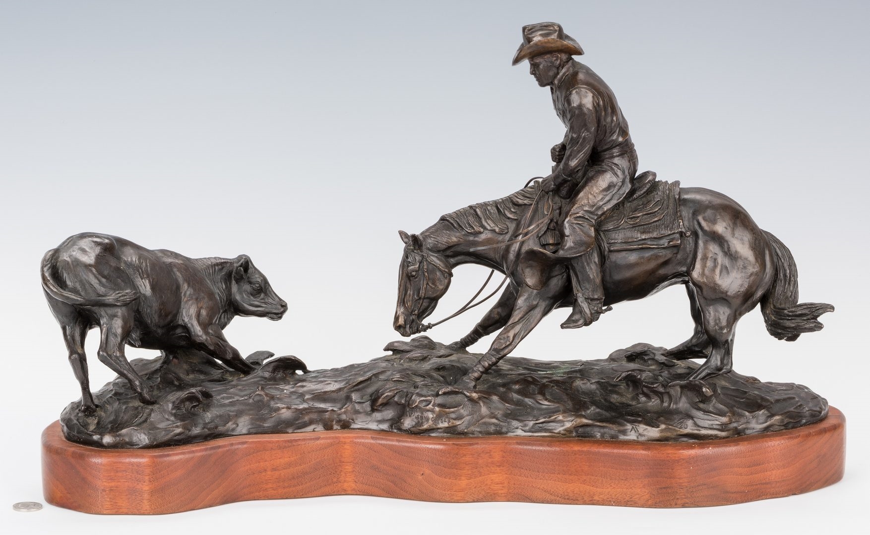 Terry Murphy | A cowhand on horseback wrangling a steer on a ...