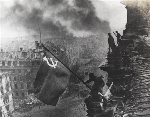 Yevgeny Khaldei | Raising a flag over the Reichstag, Berlin | MutualArt