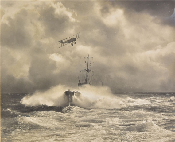Alfred G. Buckham | Dramatic photograph of a British biplane passing ...