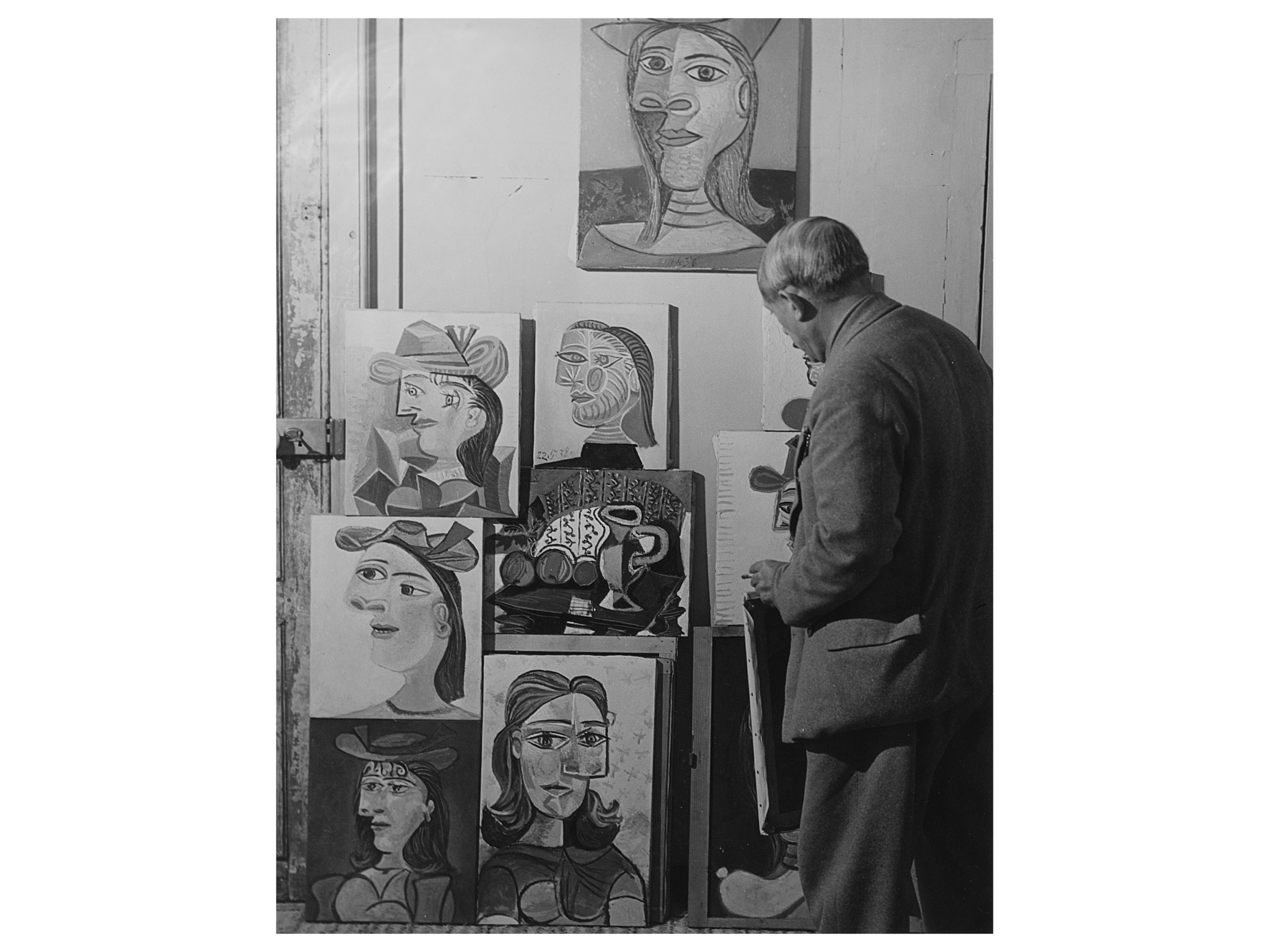 Brassaï | PICASSO LIGHTING A PIPE (Circa 1940) | MutualArt