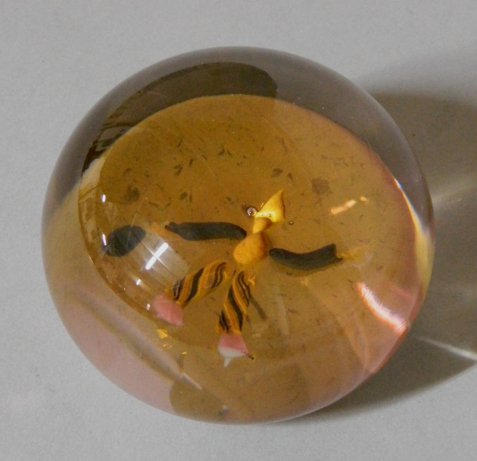 Dominick Labino | Glass paperweight with figure in center | MutualArt