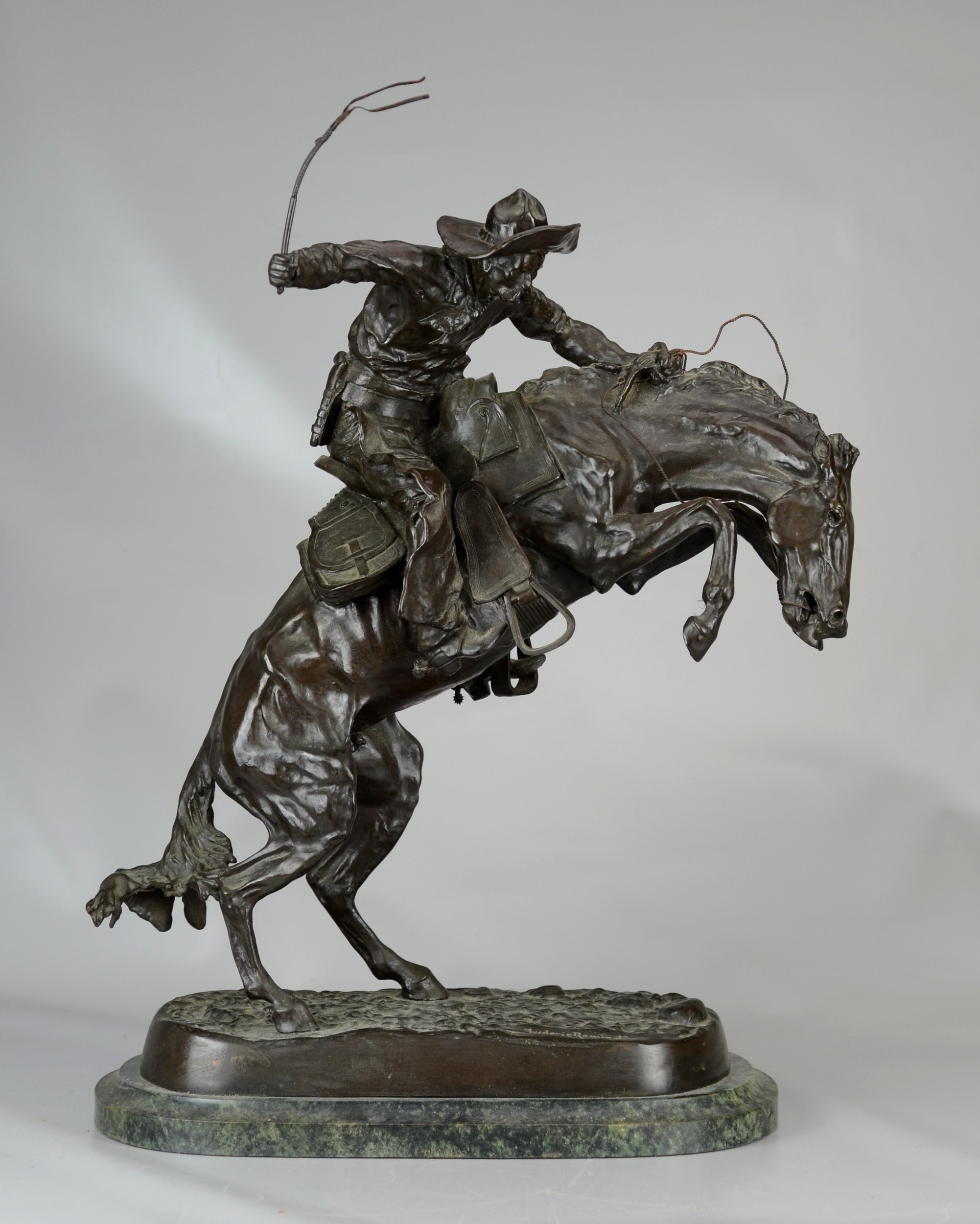 Frederic Remington | Bronco Buster | MutualArt