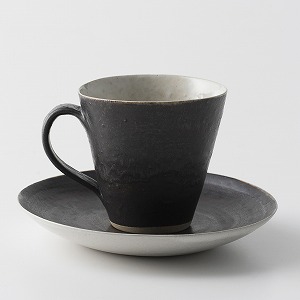 Lucie Rie | 2 Works: Black Glazed Cup and Saucer (Circa 1965) | MutualArt