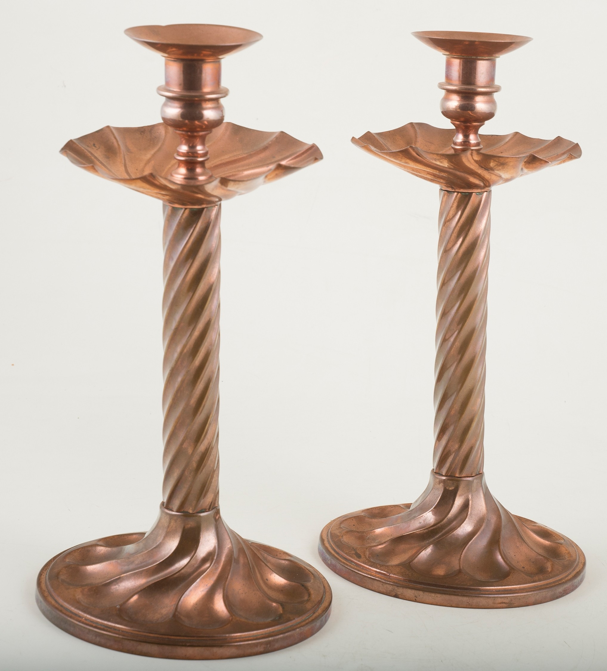 W.A.S. Benson | Pair of copper candlesticks | MutualArt