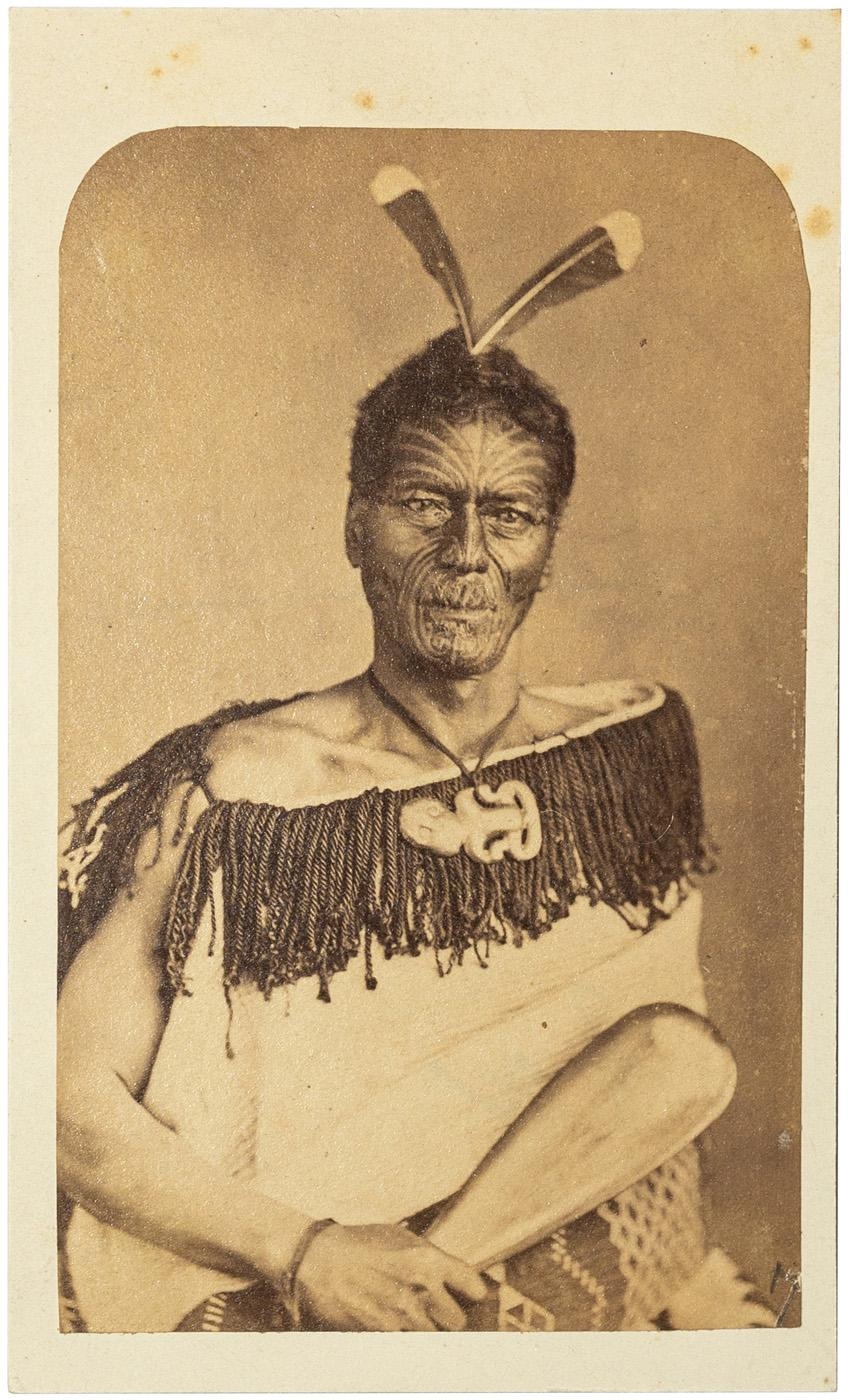 Foy Brothers | Portrait of Māori man with moko, two Huia tail feathers ...