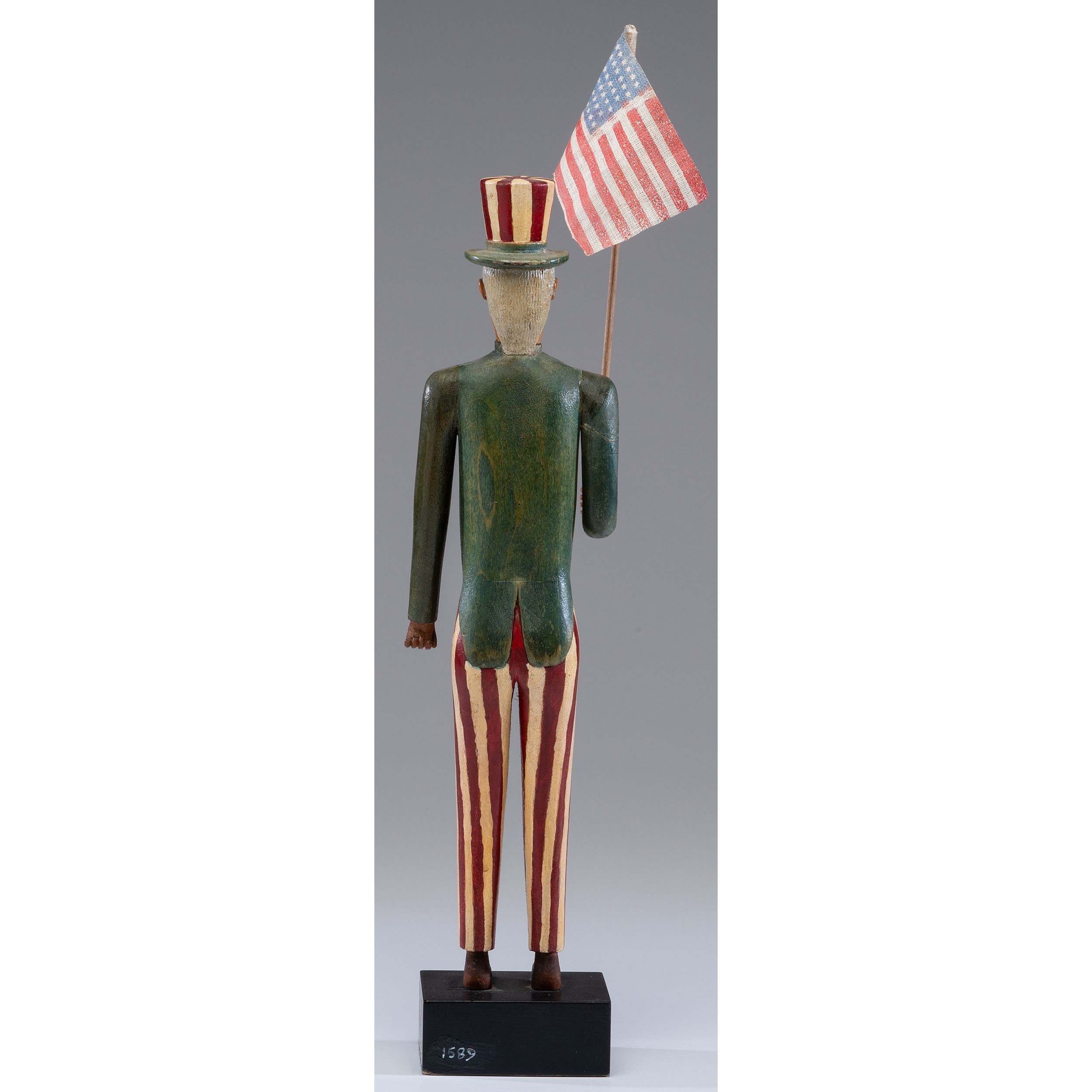 Ralph Buckwalter | A folk art carved Uncle Sam standing figure | MutualArt