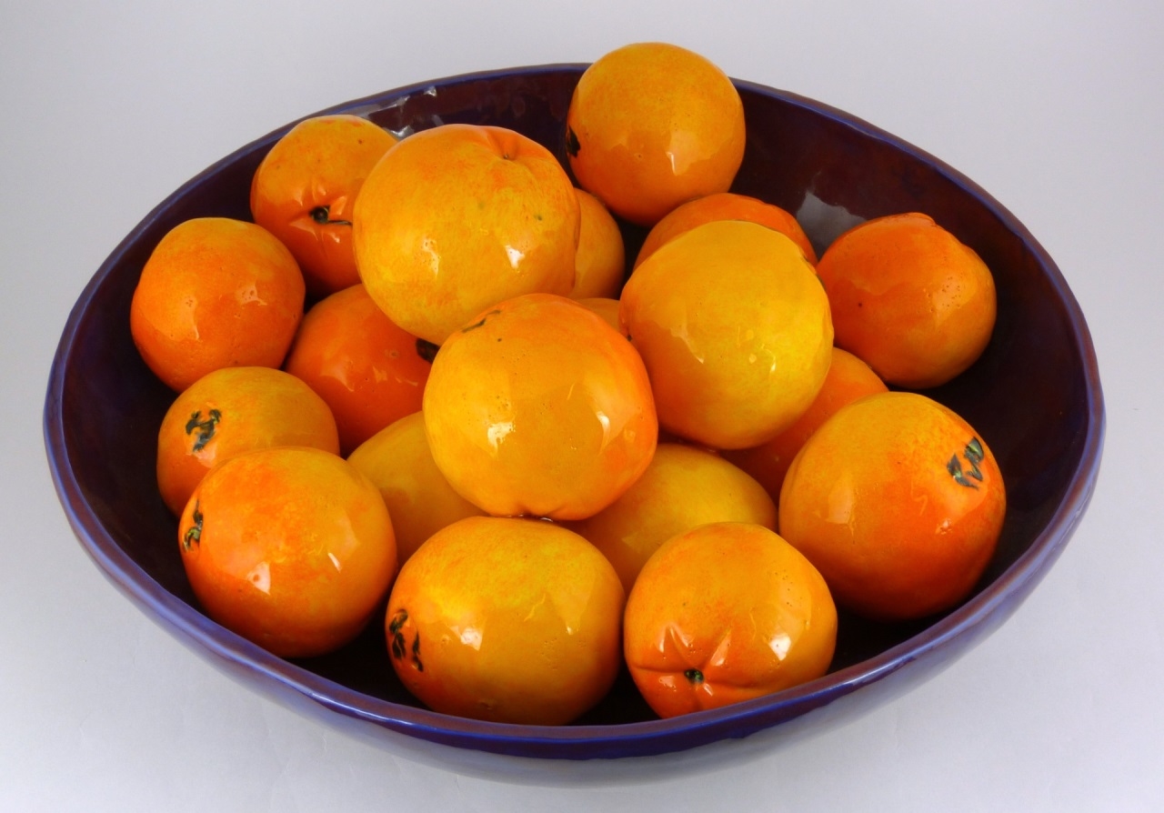 Betty Spindler | bowl with 19 oranges (1999) | MutualArt