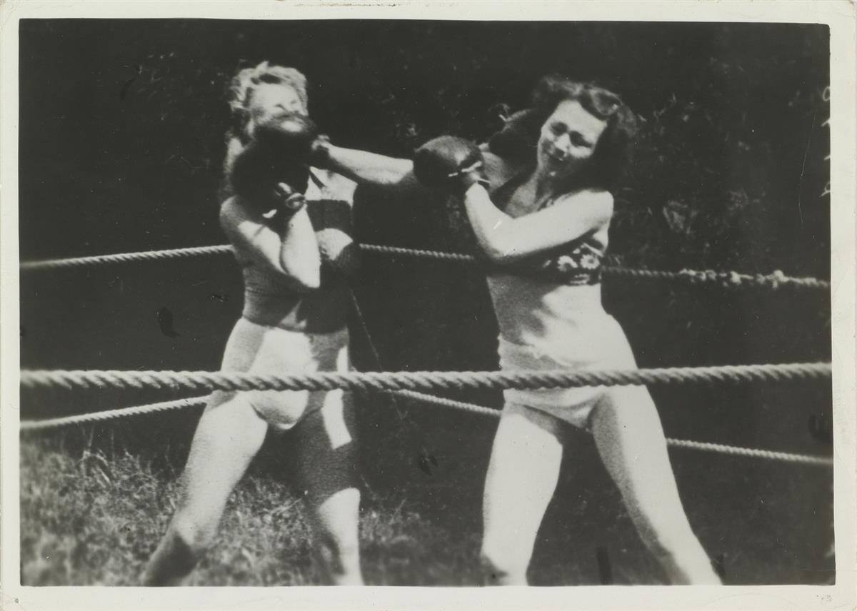 Bernard Kobel | A group of approximately 58 female boxing and wrestling ...