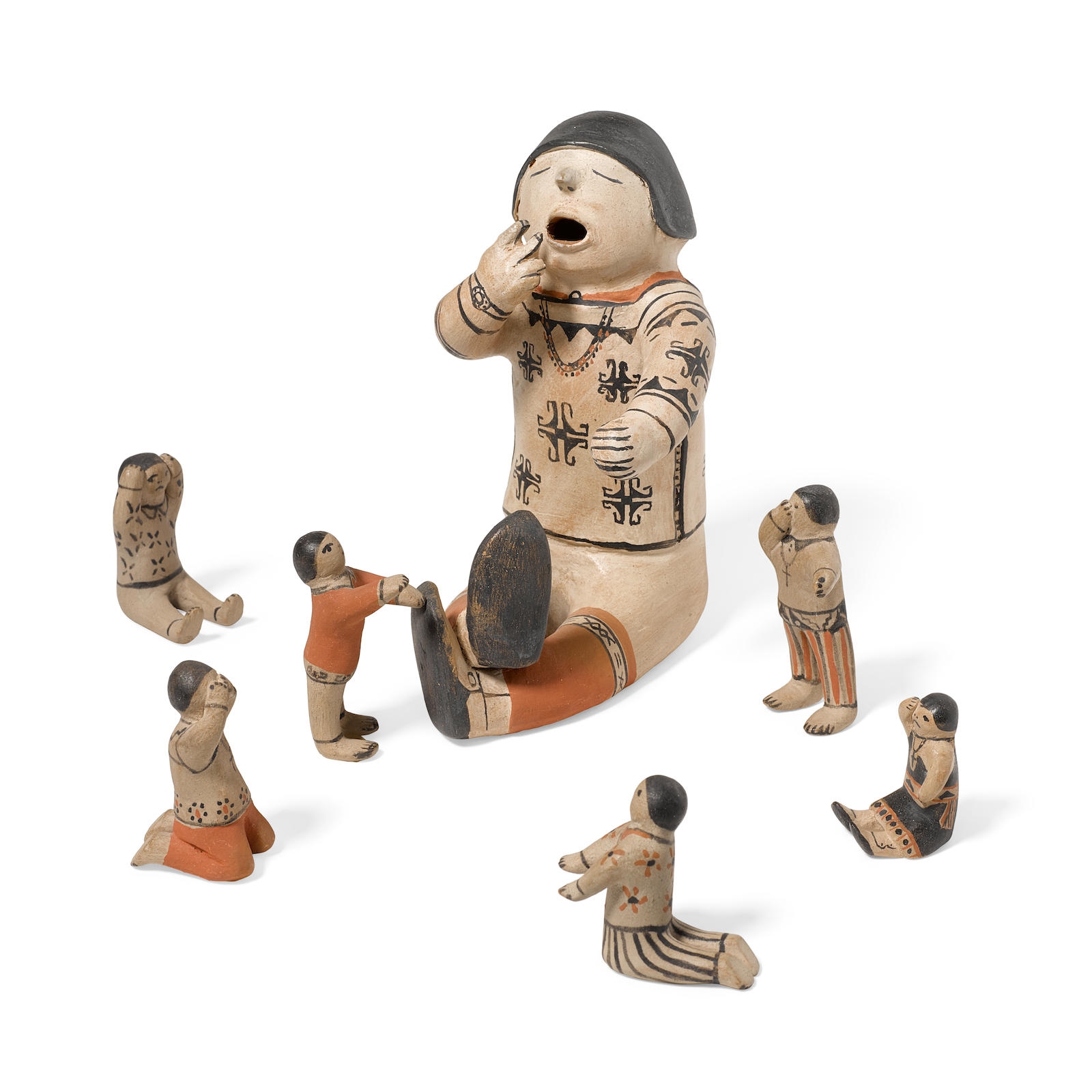 Helen Cordero | A Helen Cordero pottery storyteller figural group ...