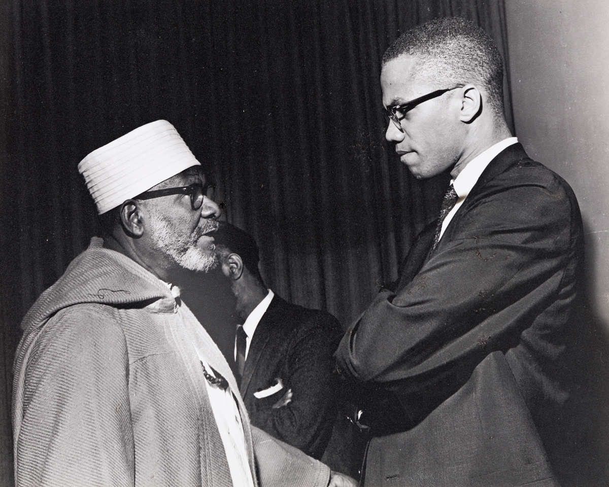 Robert L. Haggins | A group of 12 photographs of Malcolm X, including ...