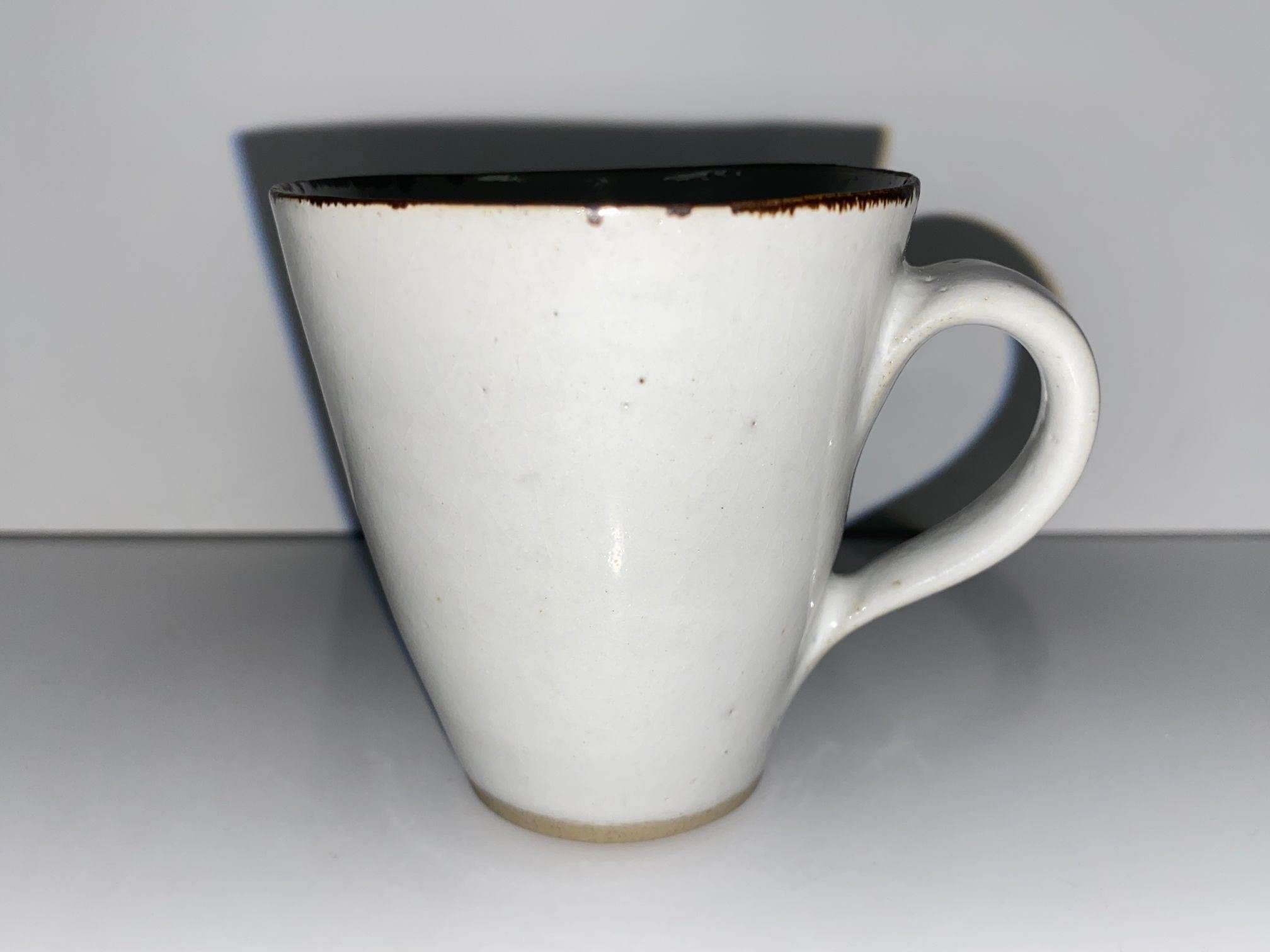 Lucie Rie | Lucie Rie (1902-1995) A pair of cream glazed stoneware ...