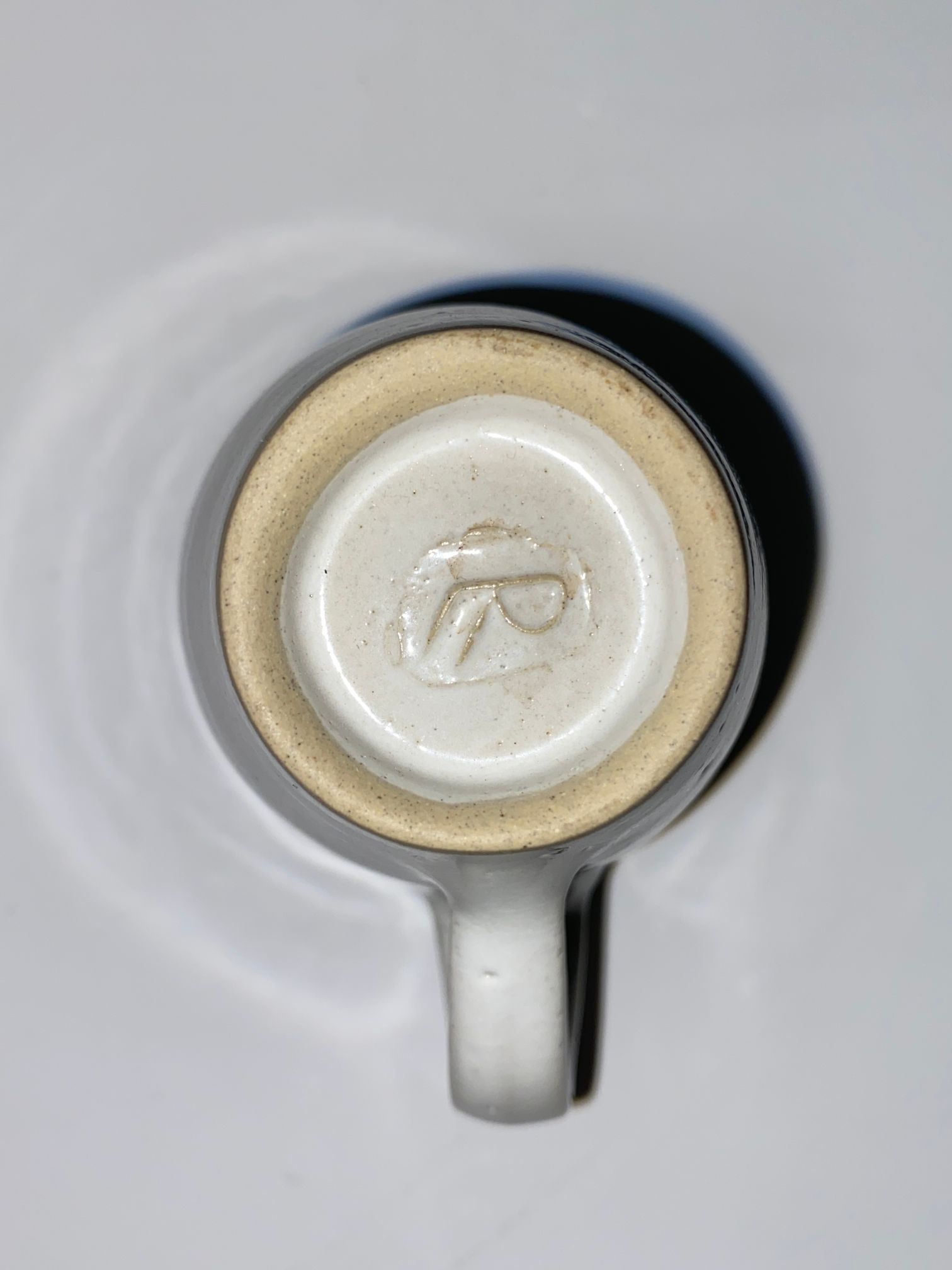 Lucie Rie | Lucie Rie (1902-1995) A pair of cream glazed stoneware ...