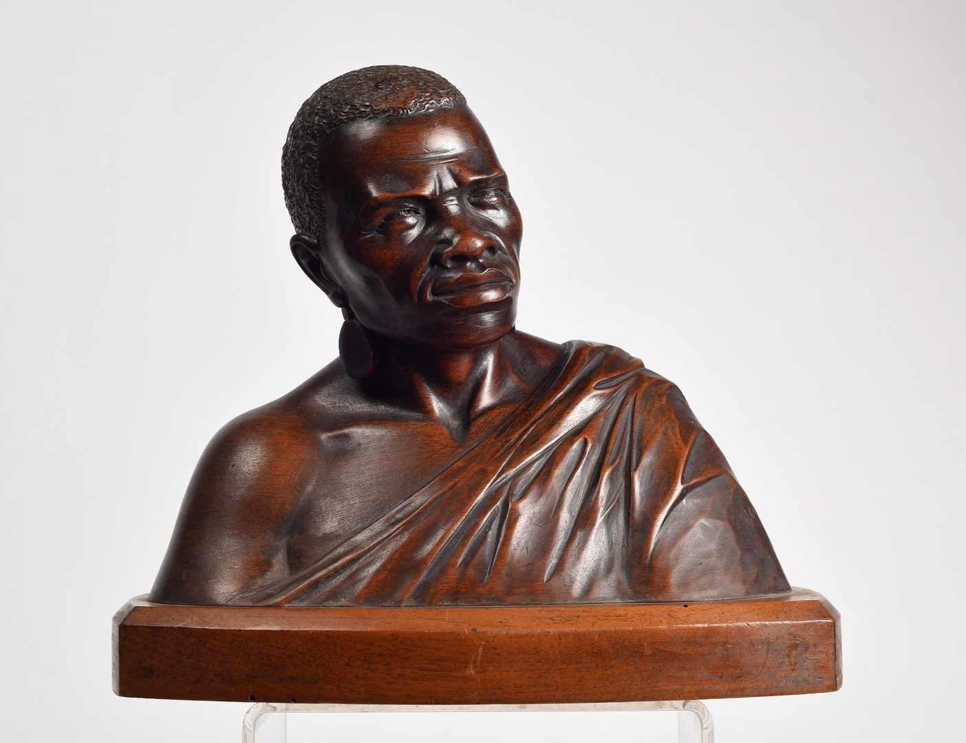 J. Chartron | Buste d'esclave en noyer noirci | MutualArt