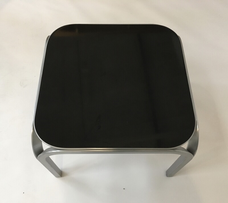 Jørn Utzon | A coffee table with aluminium frame and black plastic top ...