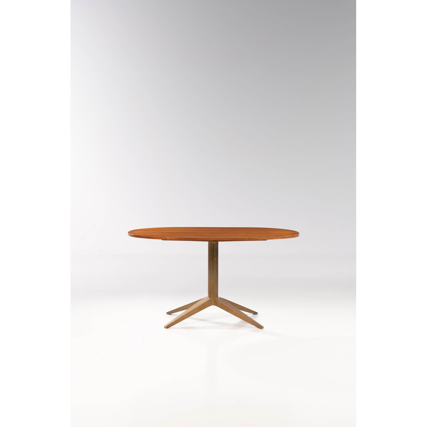 Gio Ponti | Italian walnut and brass dining table with four leaves by ...