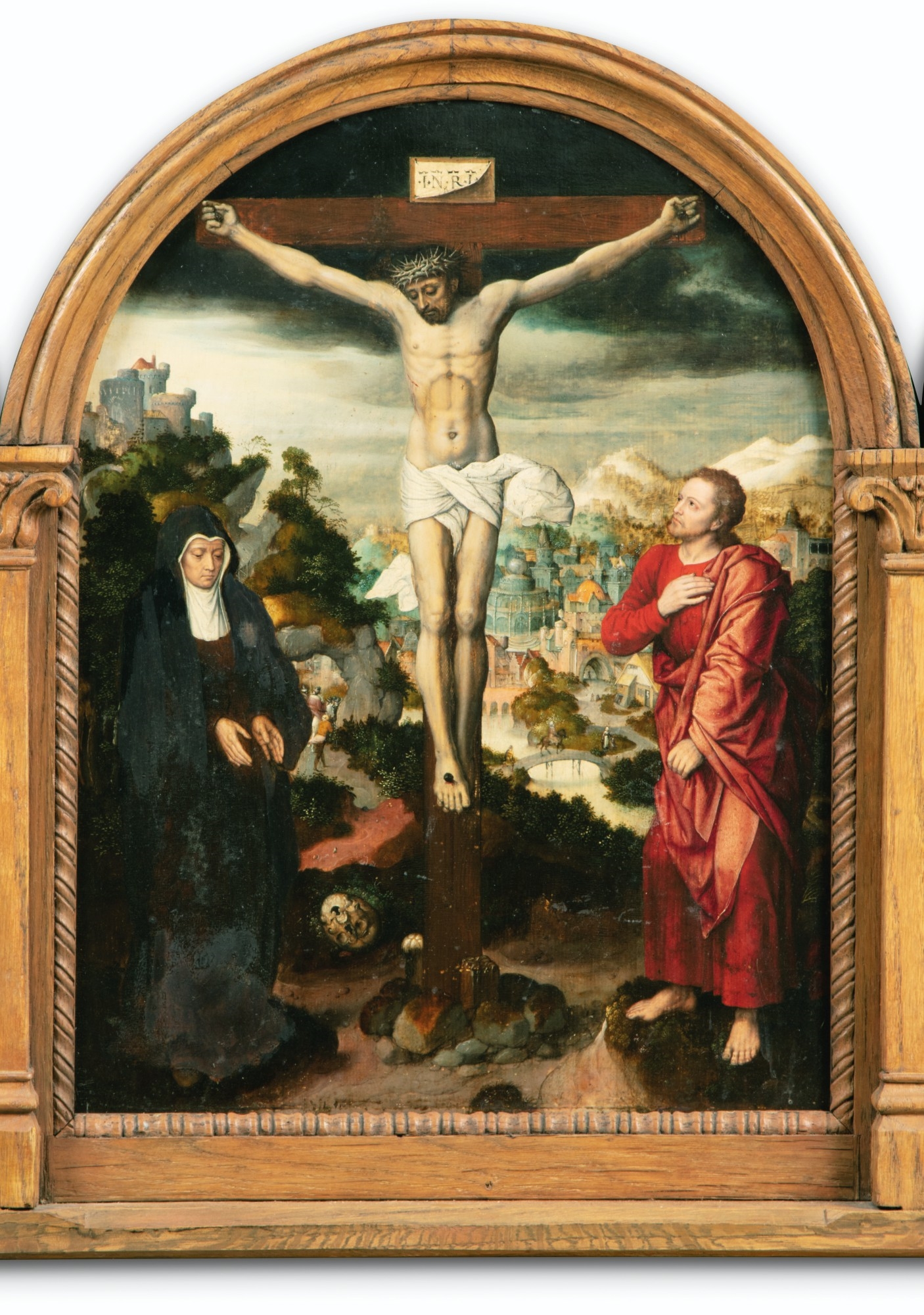 Pieter Claeissens I | A PORTABLE TRIPTYCH: THE CRUCIFIXION (CENTRAL PANEL); DONATOR WITH ST JOHN ...