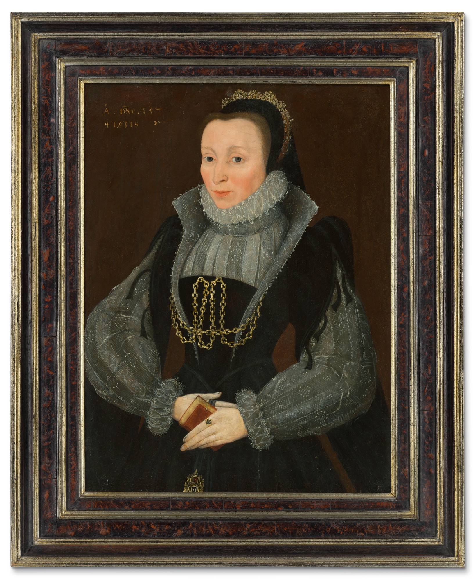 George Gower | Portrait of a lady, half-length, in a dark dress with ...