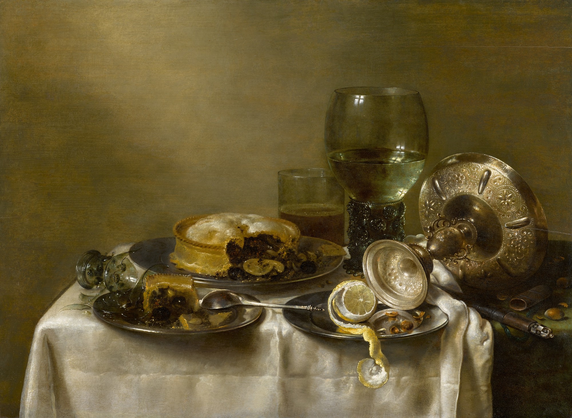 Willem Claesz. Heda | A still life with an overturned silver tazza ...
