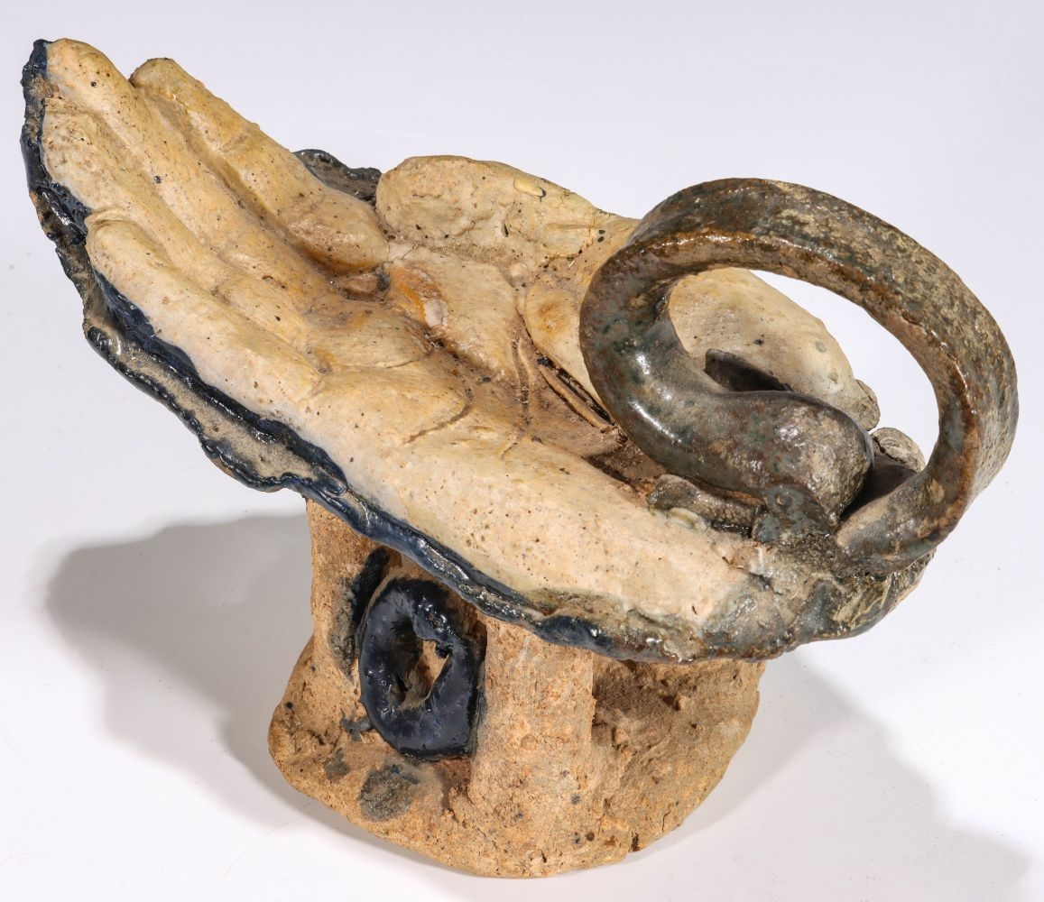 Jim Leedy | The stoneware built as an outstretched hand with strap ...