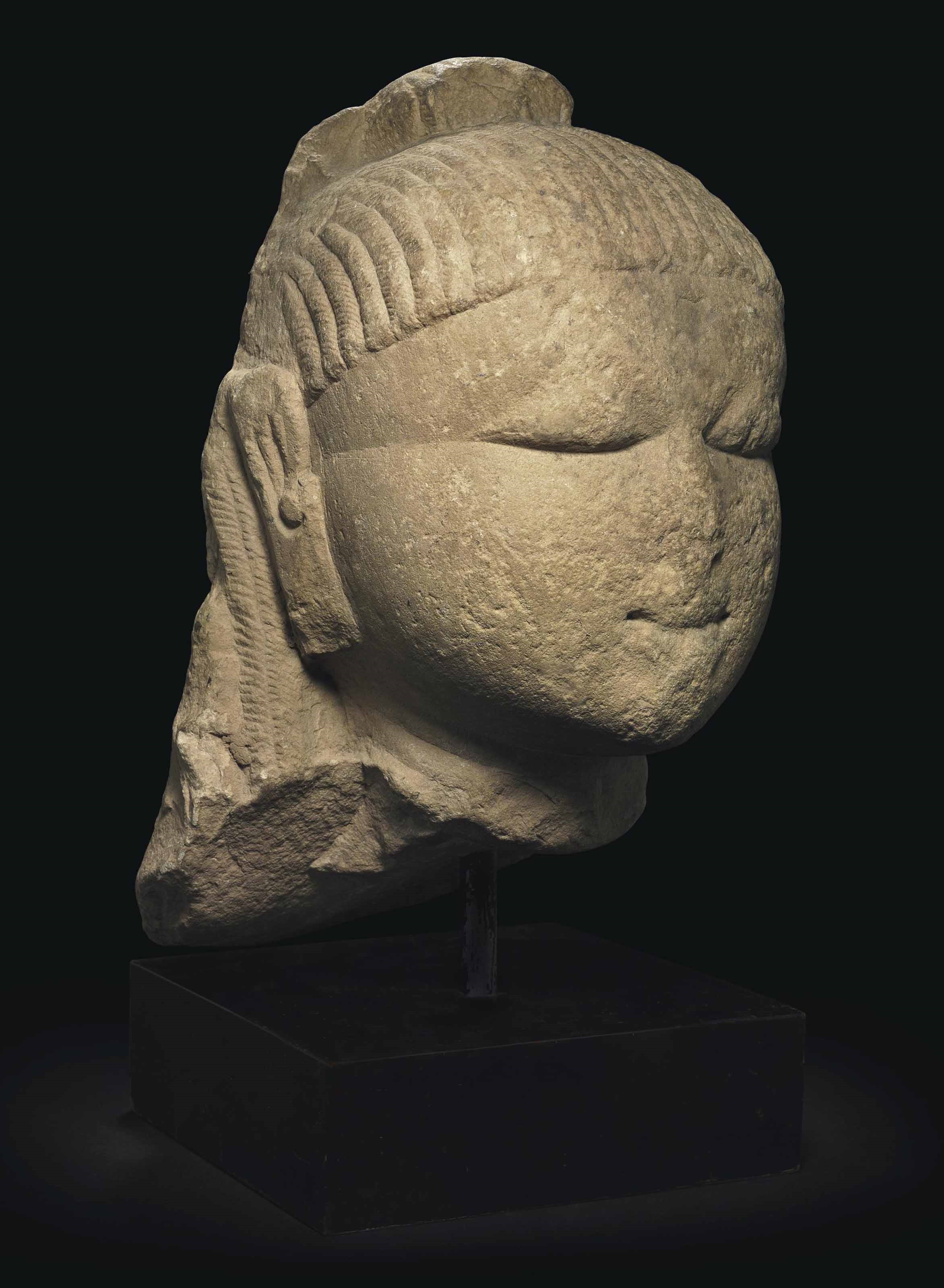 Indian School, 9th Century | A SANDSTONE HEAD OF A JINA | MutualArt