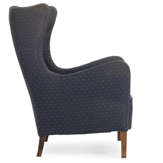 Jacob Kjaer | A wingback chair with brazilian rosewood frame | MutualArt