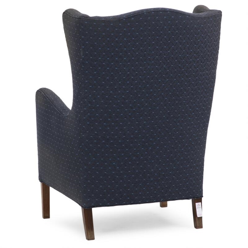 Jacob Kjaer | A wingback chair with brazilian rosewood frame | MutualArt