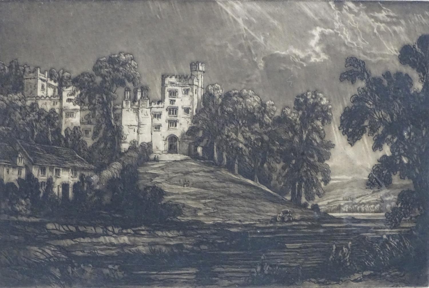 Henry Macbeth-Raeburn | A landscape scene with a castle on a hill by a ...