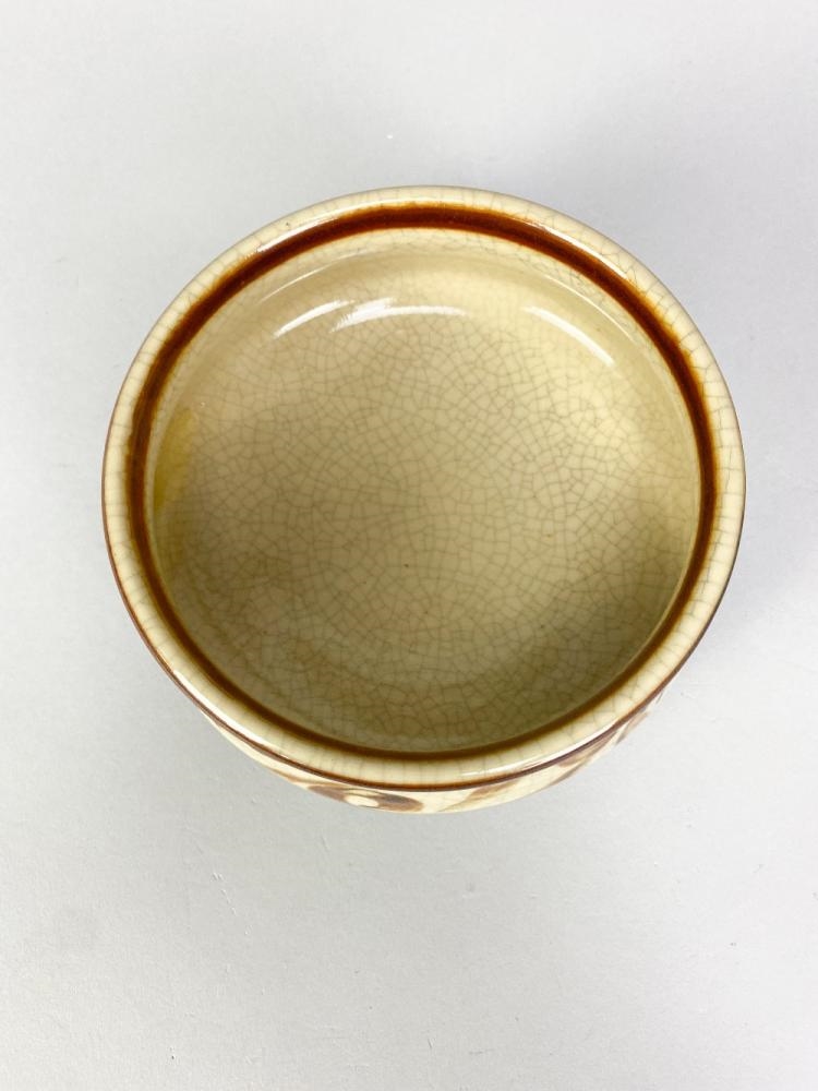 Agnete Hoy | a porcelain footed bowl covered in pale yellow crackle ...