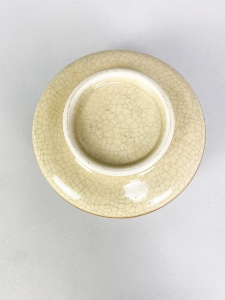 Agnete Hoy | a porcelain footed bowl covered in pale yellow crackle ...