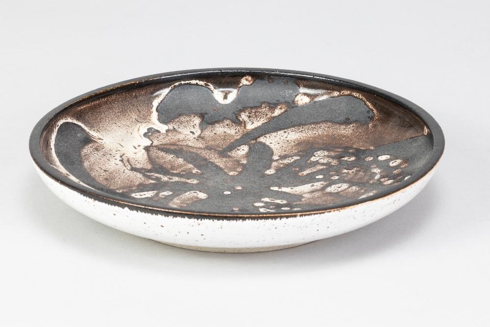 Barbara Cass | a shallow stoneware dish with white and iron glaze over ...