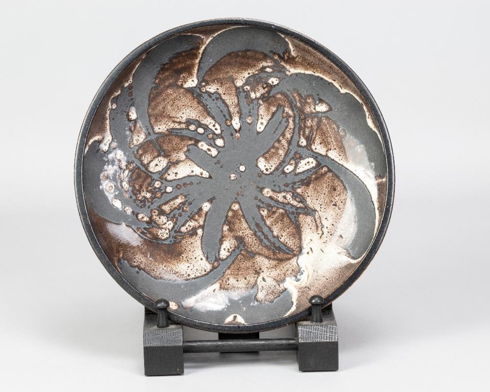 Barbara Cass | a shallow stoneware dish with white and iron glaze over ...