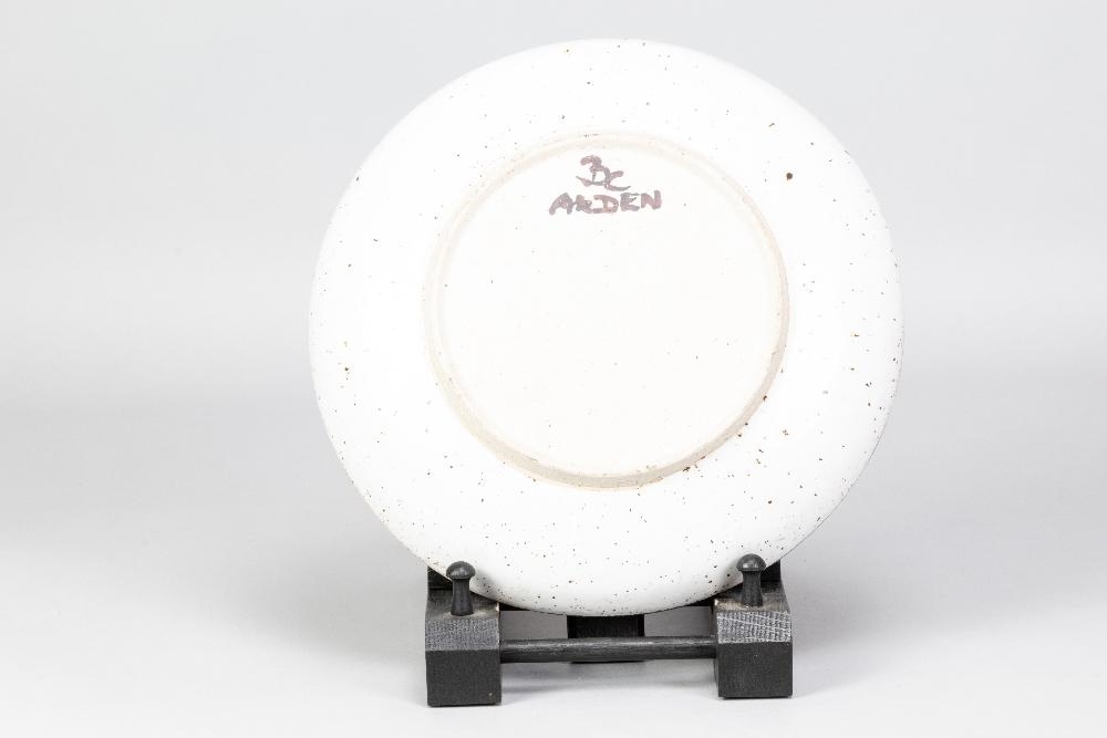 Barbara Cass | a shallow stoneware dish with white and iron glaze over ...