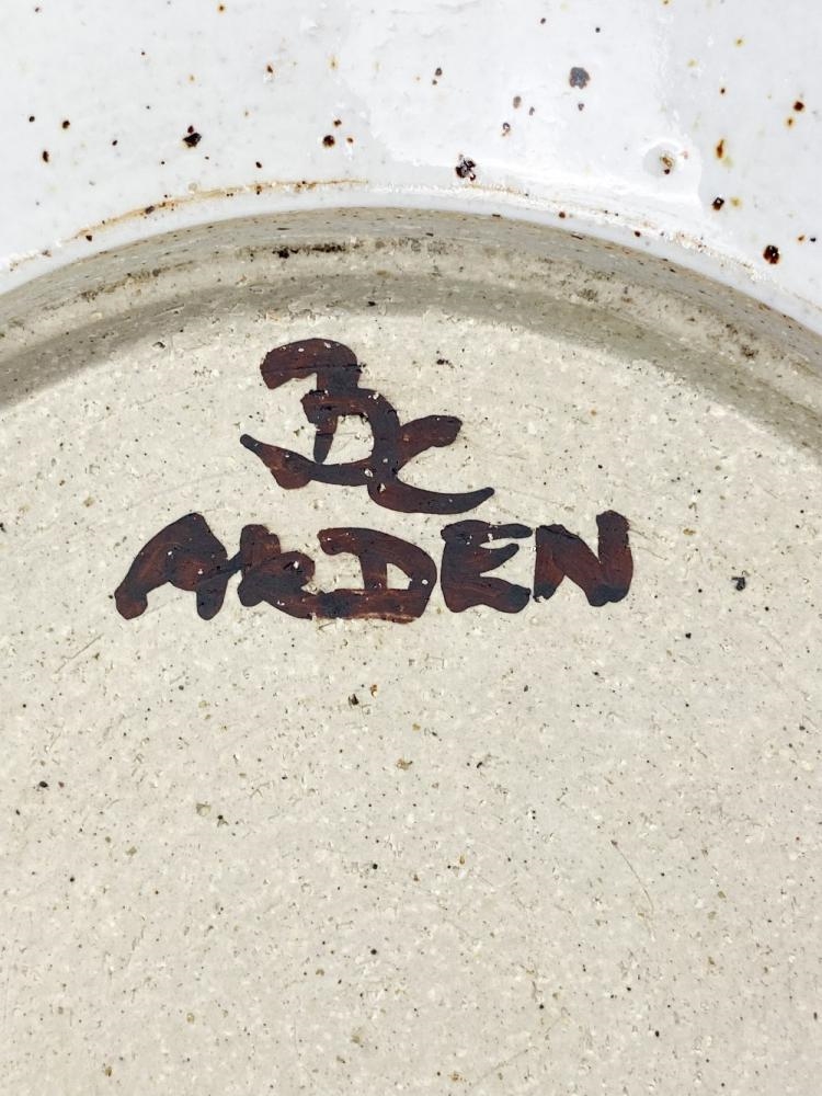 Barbara Cass | a shallow stoneware dish with white and iron glaze over ...