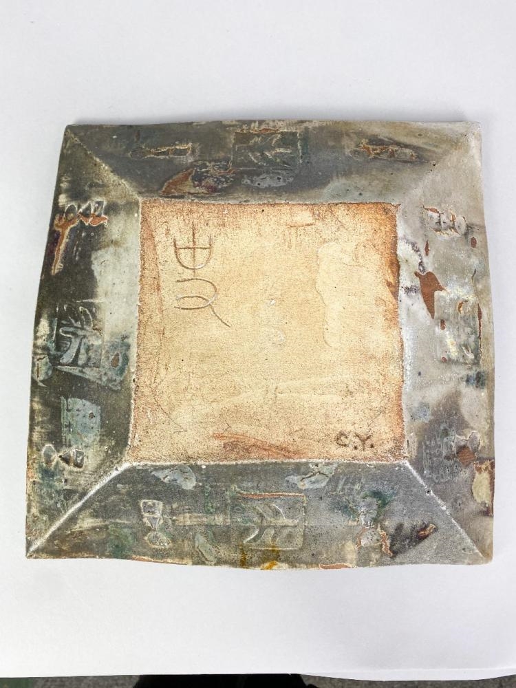 Catherine Yarrow | a large square stoneware dish covered in shades of ...
