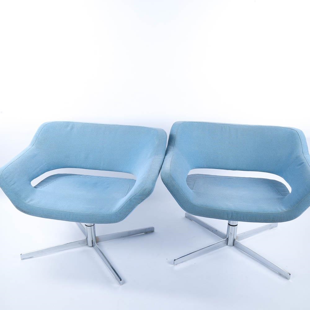 Simon Pengelly | a pair of HM85 lounge chairs on swivel/return base ...