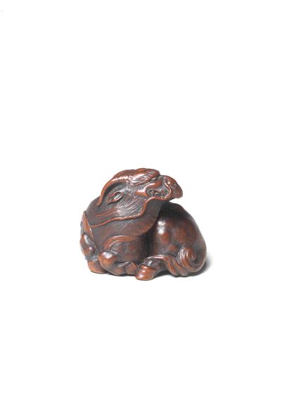 Ikkan | NETSUKE OF A RECUMBENT KIRIN | MutualArt