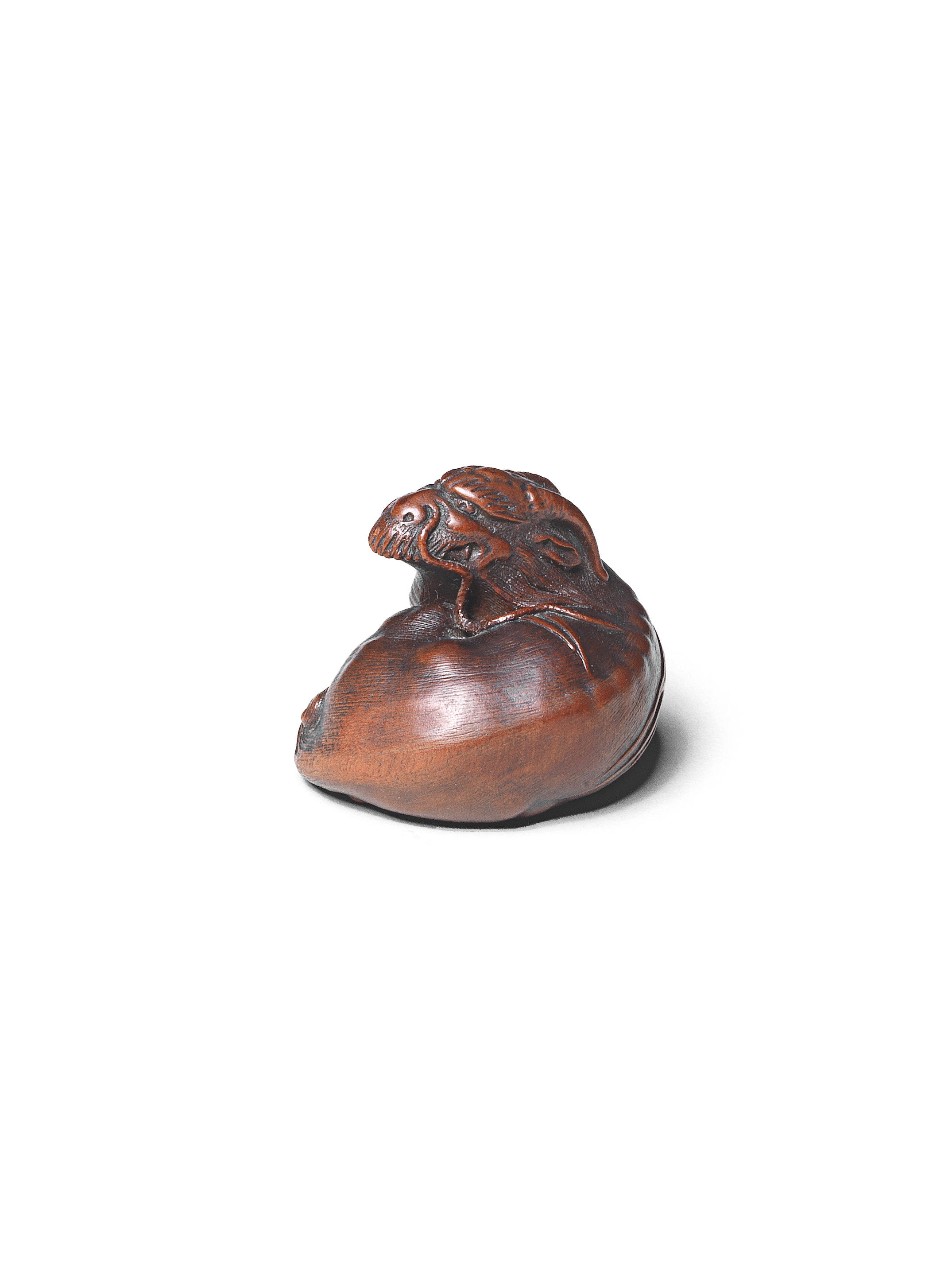 Ikkan | NETSUKE OF A RECUMBENT KIRIN | MutualArt