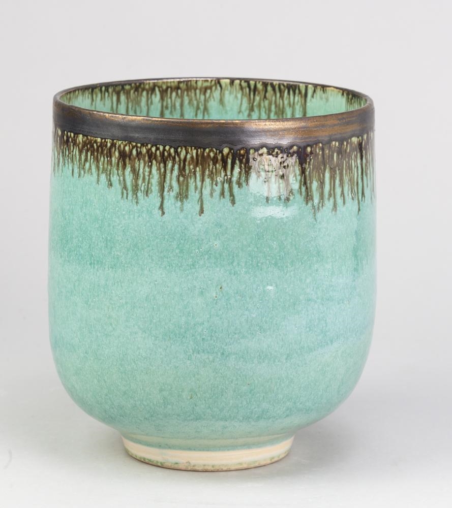 Abdo Nagi | a deep stoneware vessel covered in glossy turquoise glaze ...
