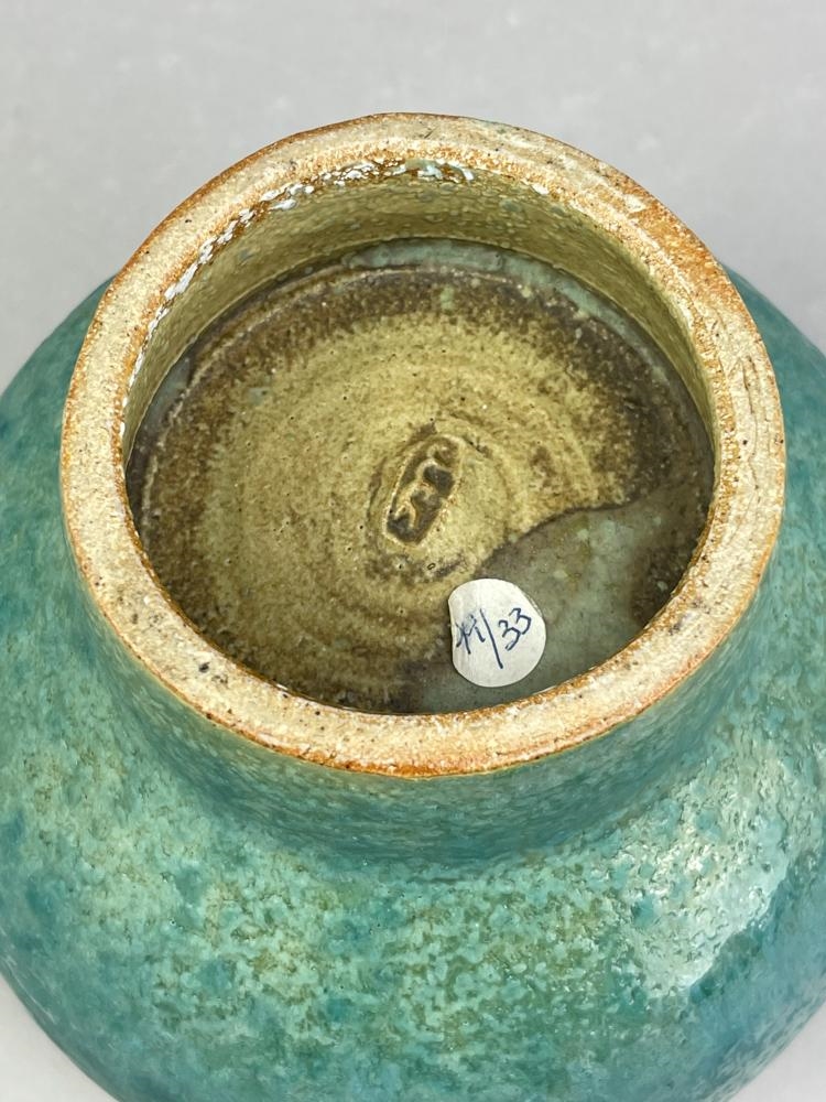 Abdo Nagi | a stoneware pedestal bowl covered in mottled turquoise ...