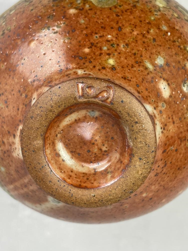 Alex Shimwell | a stoneware bowl squeezed to an oval at the rim covered ...