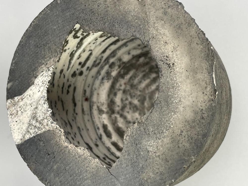 Glynn Hugo | a stoneware pedestal form with a wide disc rim covered in ...