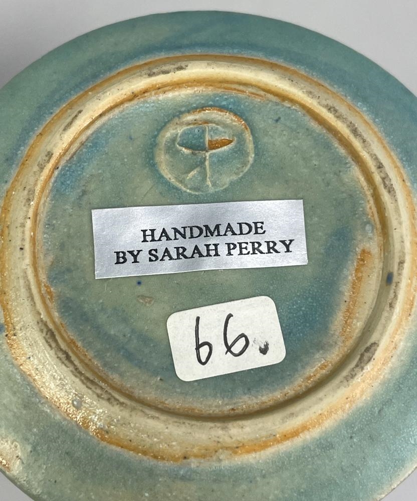 Sarah Perry | a tall cylindrical stoneware vessel squeezed to an oval ...